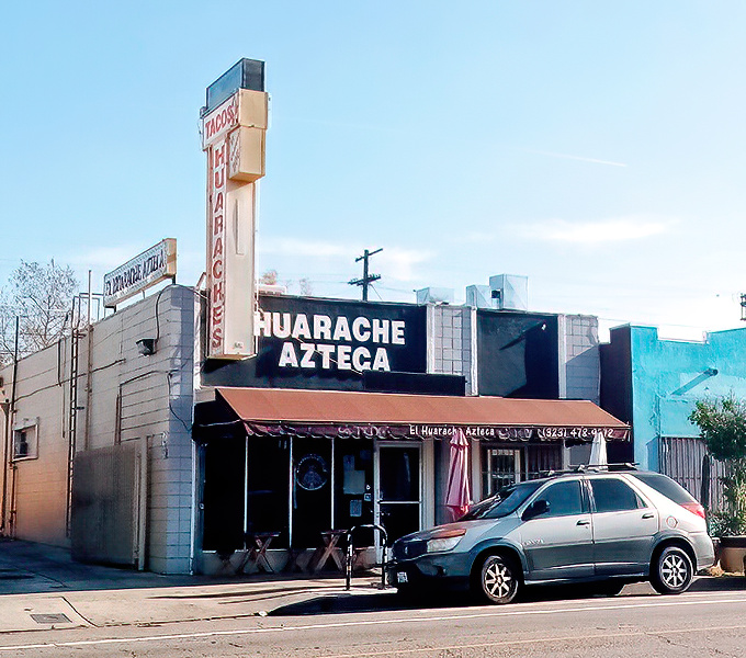The iconic storefront of El Huarache Azteca stands proudly on York Boulevard, a beacon of authentic Mexican cuisine in Highland Park's vibrant landscape.
