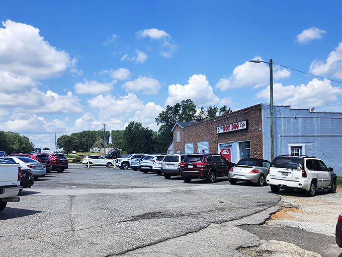 The unassuming brick facade of The Hot Dog Cafe proves once again that culinary treasures often hide behind the most modest exteriors.