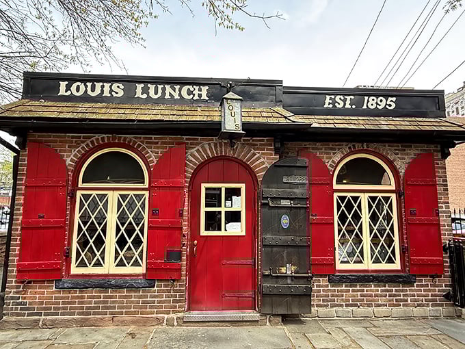 Morning light bathes the historic fa&ccedil;ade in a warm glow, highlighting the diamond-paned windows that have witnessed over a century of hungry customers.