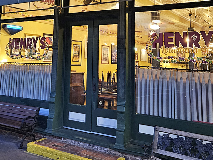 The warm glow of Henry's storefront beckons like a lighthouse for hungry souls navigating the sea of mediocre dining options.
