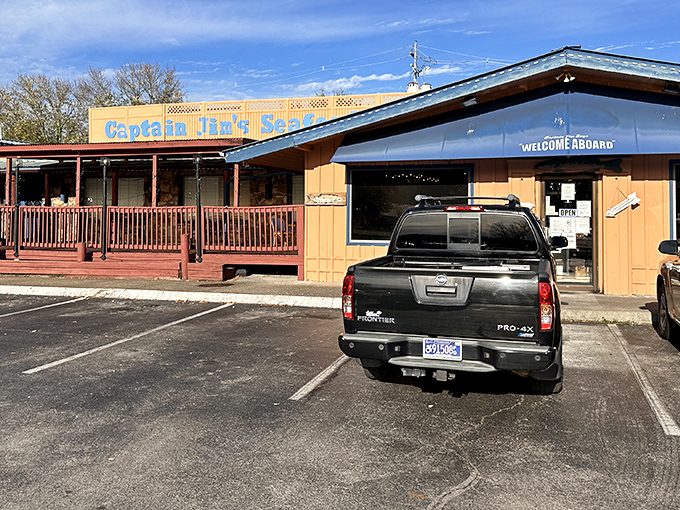 The welcoming wooden exterior with its "Welcome Aboard" sign promises a nautical adventure in the heart of mountain country.