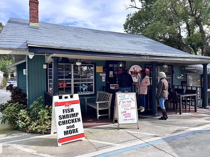 The unassuming green exterior of Tony's Clam Chowder House in Mount Dora beckons seafood lovers like a lighthouse calling ships to shore.