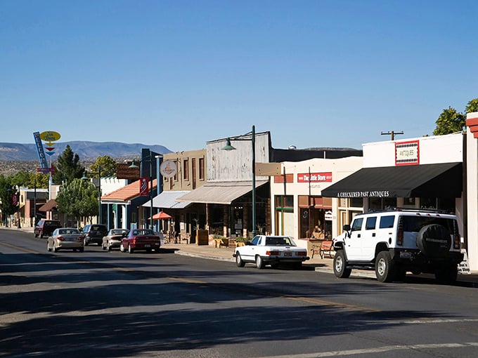 Main Street stretches ahead like a Norman Rockwell painting, where pickup trucks and politeness coexist in perfect harmony.
