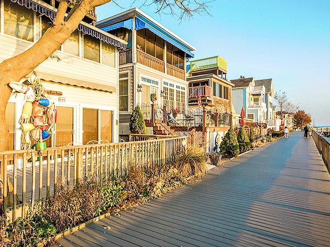 North Beach's boardwalk at golden hour&mdash;where charming waterfront homes line up like eager theatergoers waiting for nature's daily sunset show.