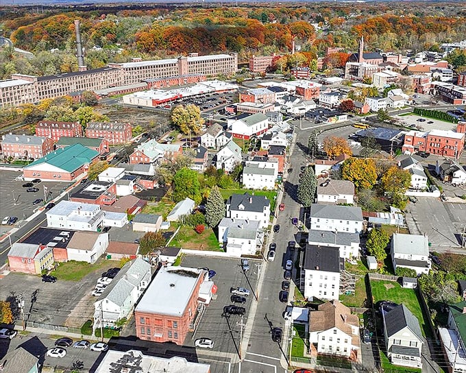 Downtown Chicopee's brick buildings stand like friendly sentinels of history, where vibrant green trees soften the urban landscape and locals still parallel park with impressive precision.