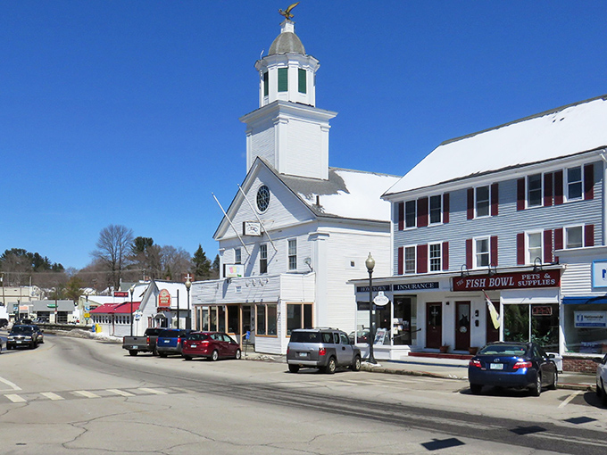 A bird's-eye view reveals Milford's perfect balance &ndash; historic architecture, the winding Souhegan River, and lush greenery creating New Hampshire's quintessential small-town tableau.