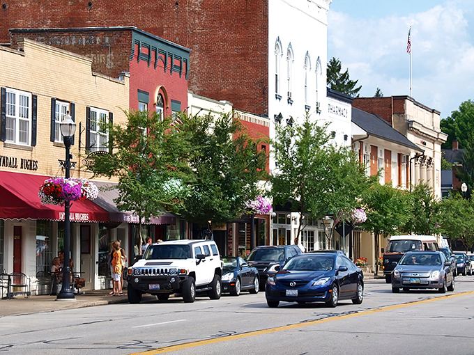 Main Street charm on full display with historic storefronts, hanging flower baskets, and that small-town vibe that makes you want to slow down and stay awhile.