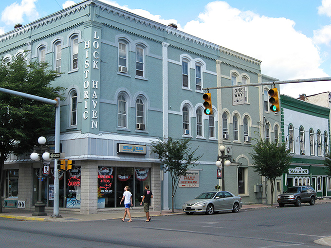 The historic Lock Haven building stands proudly on the corner, a mint-green sentinel that's witnessed generations of small-town stories unfold beneath its ornate cornices.