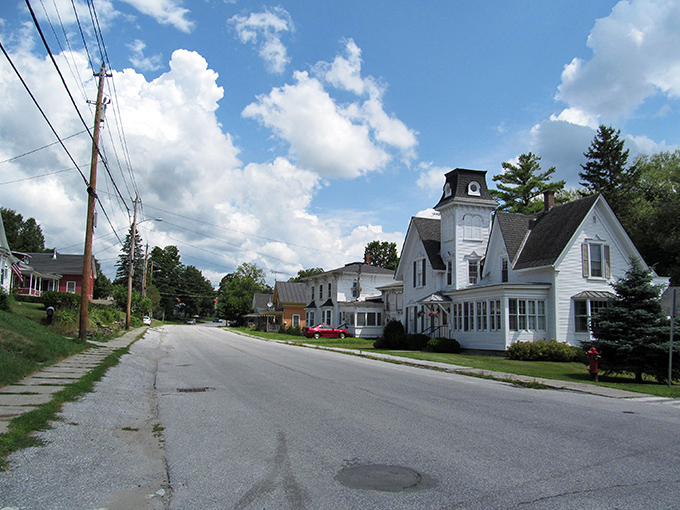 Classic Vermont charm on full display. These white clapboard houses with their distinctive architectural details practically whisper stories from another era.