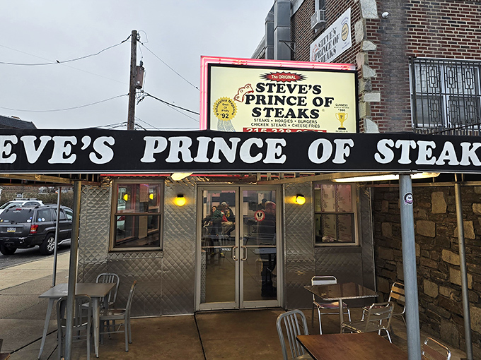 The royal entrance beckons! Steve's iconic storefront on Bustleton Avenue promises cheesesteak nirvana behind those diamond-plate doors.