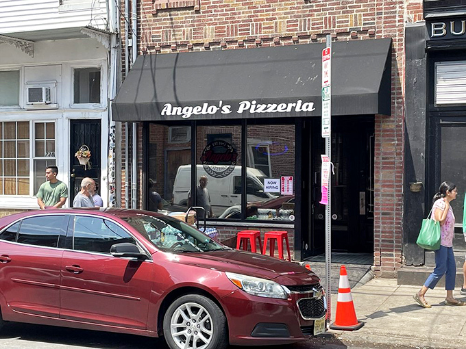 The unassuming storefront that launched a thousand food pilgrimages. Angelo's black awning signals you've arrived at cheesesteak nirvana.