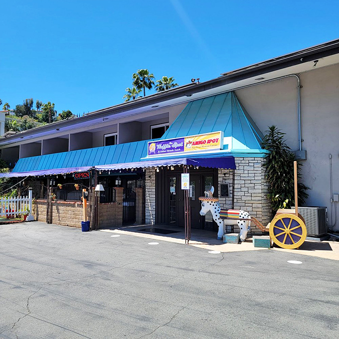 The iconic blue roof of The Waffle Spot beckons breakfast enthusiasts like a beacon of syrupy hope in San Diego's Hotel Circle.