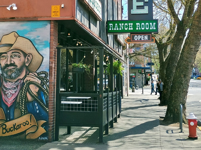 A colorful cowboy mural welcomes you to the Ranch Room, where Western charm meets downtown Bellingham's bustling sidewalks.