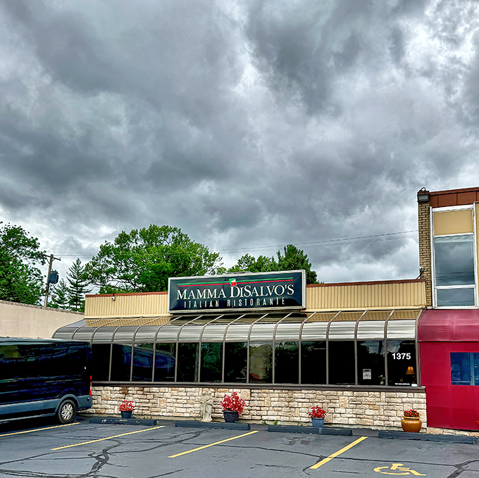 That curved awning and stone facade are your first clue that something special is happening inside this Dayton treasure.