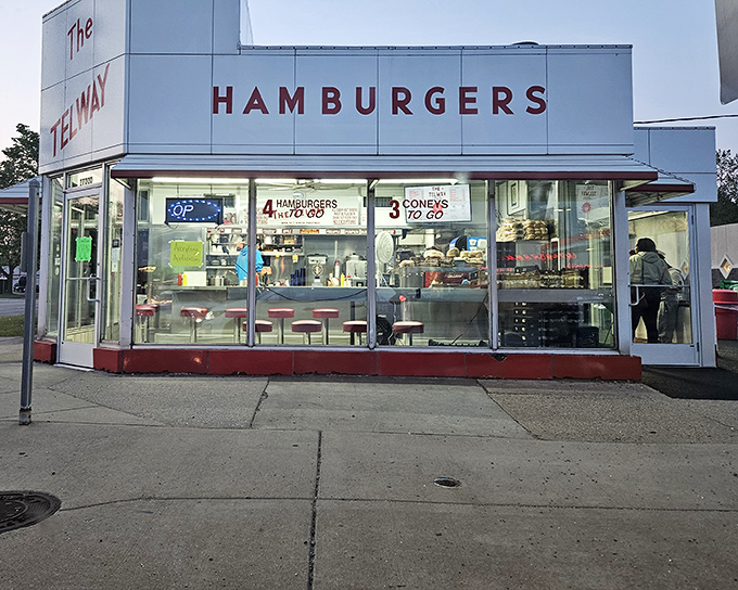 The white and red exterior of The Telway stands as a beacon of burger hope on the corner of 11 Mile and John R Road.