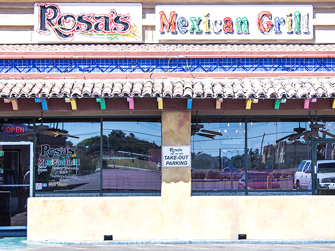 The rainbow-colored sign at Rosa's Mexican Grill promises a fiesta for your taste buds before you even step through the door.