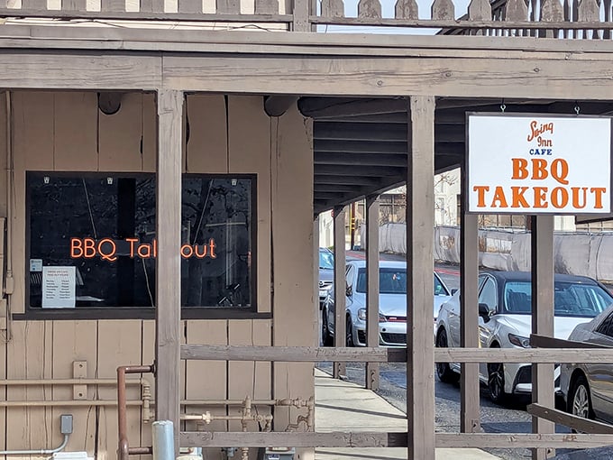 The Western-style facade of Swing Inn Cafe welcomes hungry travelers with its vintage charm and promise of BBQ treasures within.