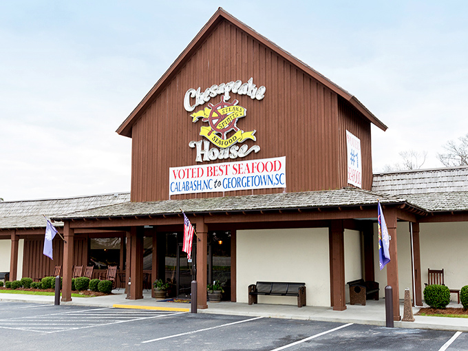 The iconic barn-like exterior of Chesapeake House stands as a beacon for seafood lovers, promising treasures that go well beyond its humble appearance.