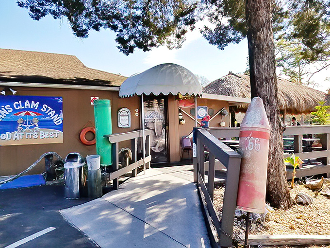 The unassuming exterior of Dan's Clam Stand proves once again that Florida's best seafood treasures often hide in plain sight, complete with that essential tiki-roof charm.