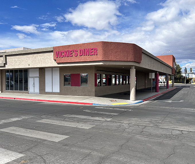 The terracotta-colored exterior of Vickie's Diner stands as a beacon of breakfast hope in a city that never sleeps but always wakes up hungry.