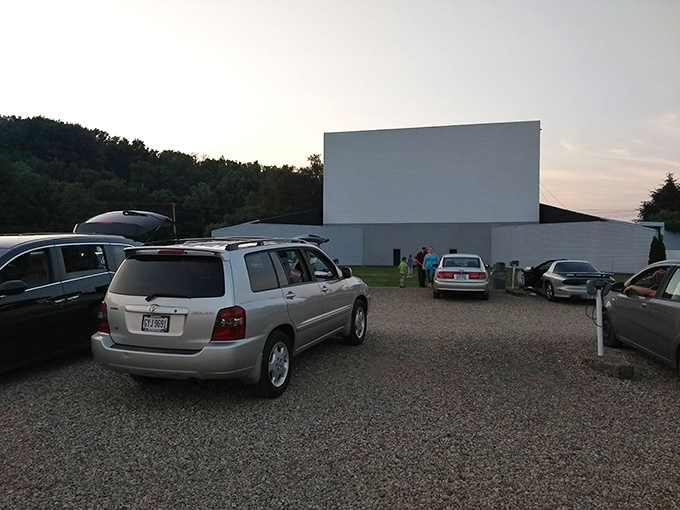 The classic white screen of Skyview Drive-In stands tall against the Ohio twilight, a beacon of nostalgia waiting to light up with cinematic magic.