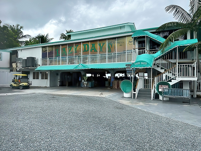 The aqua-trimmed exterior of Lazy Days stands like a beacon of Florida Keys promise &ndash; paradise with parking.