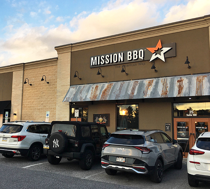 That corrugated metal awning isn't just for show&mdash;it's preparing you for the smoky goodness waiting inside this patriotic barbecue paradise.