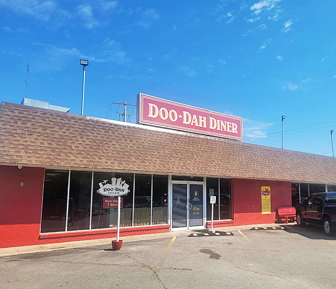 That bold red exterior and vintage sign aren't just calling your name &ndash; they're singing it in perfect diner harmony.