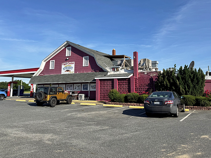 The iconic burgundy barn-like structure of Sting-Ray's stands proudly along Route 13, a beacon for hungry travelers and seafood enthusiasts alike.