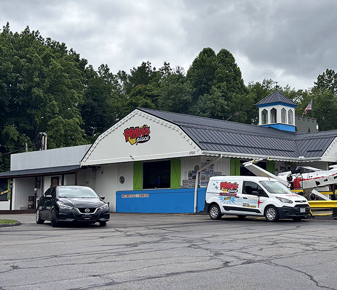 Mike's Place stands proudly in Kent, its distinctive blue cupola and colorful facade promising culinary adventures that defy small-town expectations.