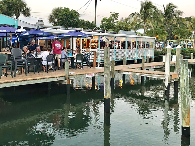 The turquoise beacon of seafood salvation! Casey Key Fish House's entrance promises Florida dining without pretense&mdash;just add appetite and a willingness to slow down.
