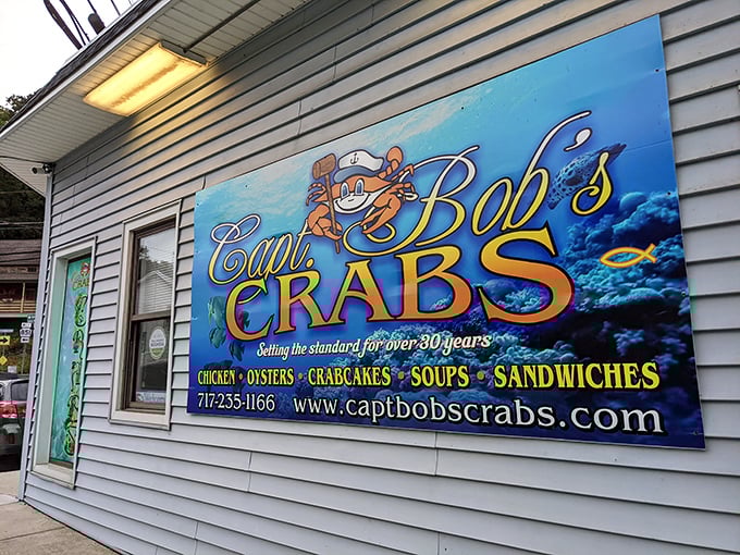 That cheerful crab mascot on the sign promises oceanic delights in the Pennsylvania heartland, and spoiler alert: he delivers.