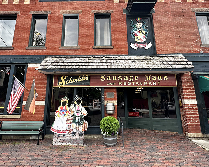 Behind that unassuming storefront lies a world of authentic German delights. The family crest above signals you've found the real deal&mdash;no lederhosen required, but certainly appreciated.