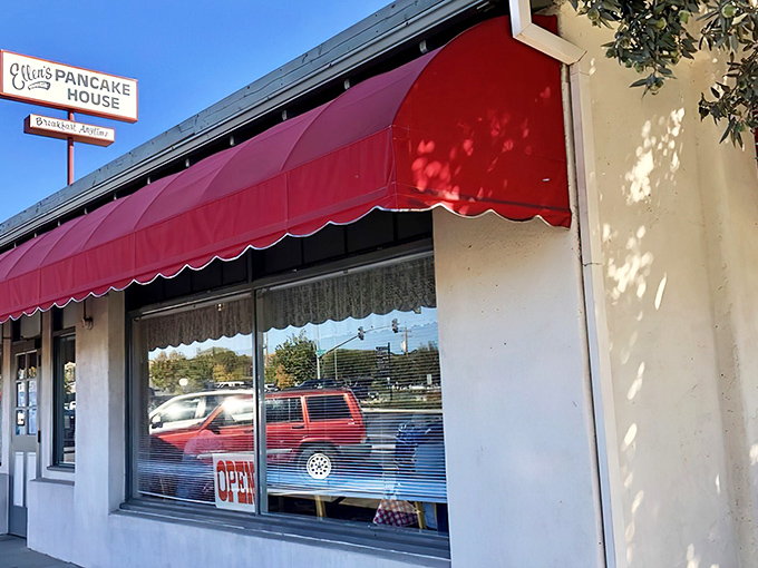 That welcoming red awning isn't just decoration&mdash;it's a beacon calling hungry travelers to breakfast paradise.