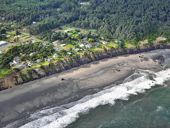 Aerial dreams come true: Nesika Beach unfolds like nature's perfect postcard&mdash;dramatic cliffs, pristine sand, and the endless Pacific stretching toward tomorrow.