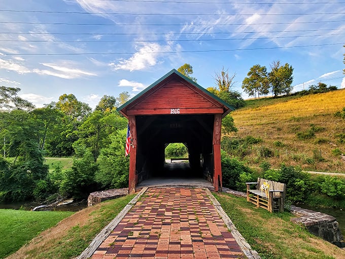 The classic red exterior and green roof of Clover Hollow Bridge stand proudly against Virginia's blue skies, like a Norman Rockwell painting come to life.