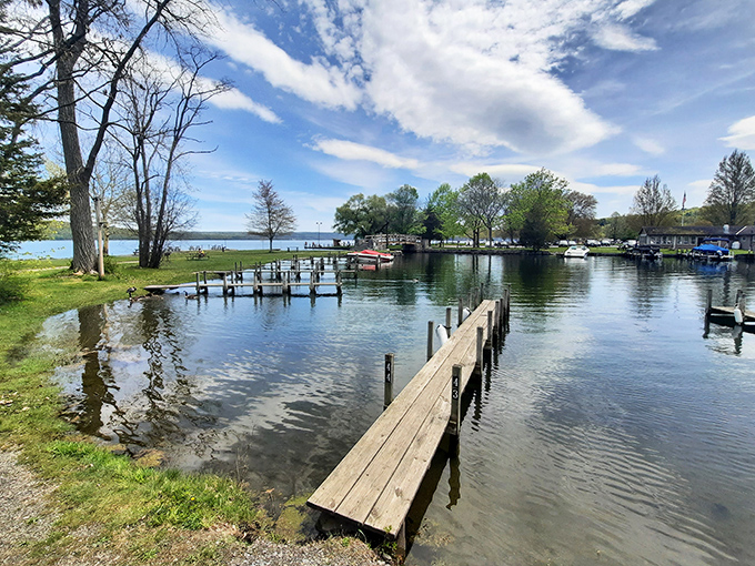 Calm waters and open skies create a picture-perfect day by the lake, where docks stretch out like invitations to unwind.