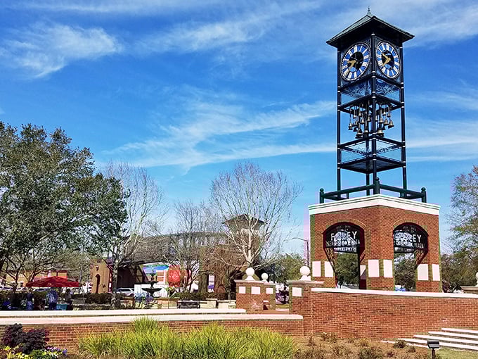 Foley's iconic clock tower stands tall against a brilliant blue Alabama sky, keeping time for a town where rushing is optional and smiling is mandatory.