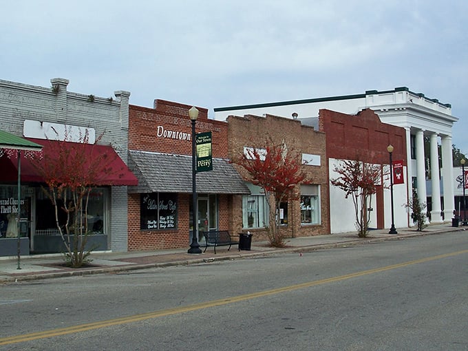 Downtown Perry's historic brick facades tell stories of simpler times, where small-town charm isn't manufactured but authentically preserved through generations.