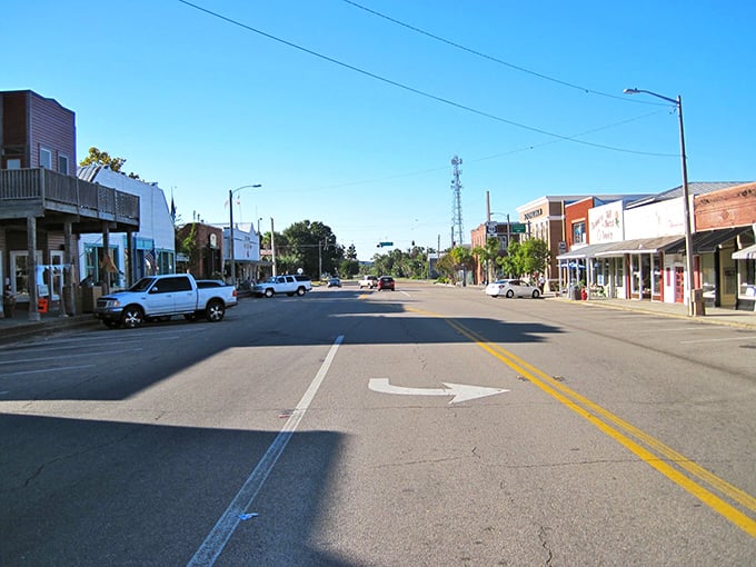 Main Street simplicity at its finest – where traffic jams involve deciding which local shop to visit first.