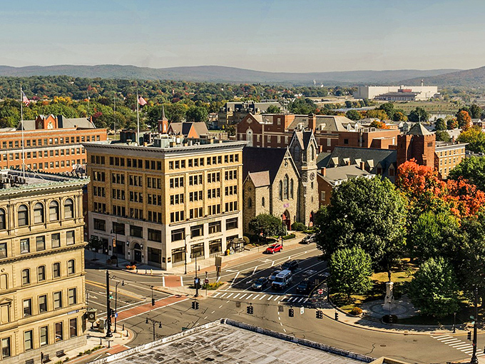 Pittsfield unfolds like a painting come to life, with historic architecture nestled against the backdrop of rolling Berkshire hills.