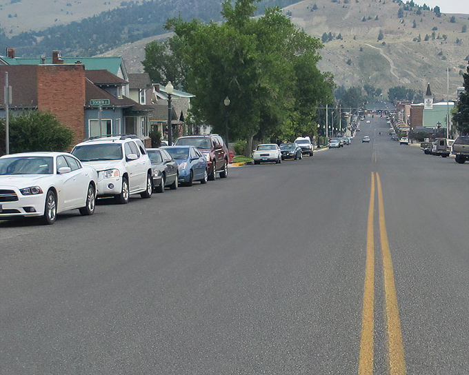 Main Street stretches toward the mountains like an invitation to slow down. In Anaconda, even the yellow lines seem to say "What's your hurry?"