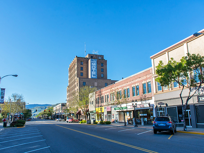 The iconic Wenatchee Motel building anchors a downtown where your dollar stretches further than your Seattle friends would believe possible.