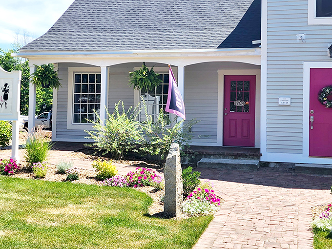 The charming white exterior with that eye-catching pink door is like Connecticut's answer to Willy Wonka's factory—but with better bread.