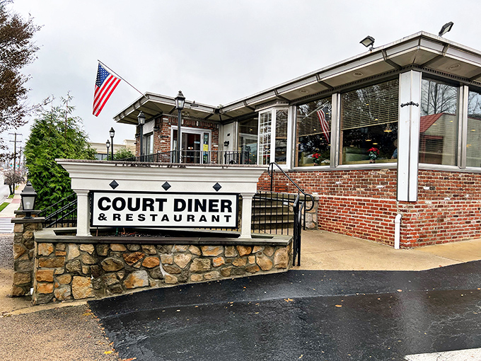 The classic brick-and-stone exterior of Court Diner welcomes you like an old friend who always knows what you need.