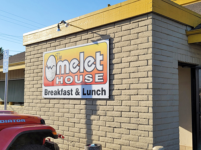 That iconic yellow trim and brick facade serve as a beacon for breakfast enthusiasts. The bat-signal for those whose superpower is appreciating good diner food.