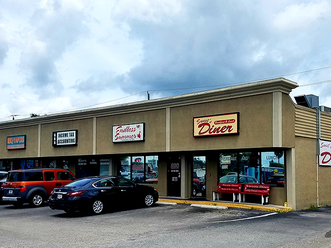 The unassuming exterior of Sweet's Diner in Port Charlotte hides culinary treasures within. Like finding a diamond in a strip mall.