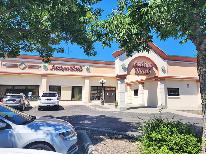 The peach-colored facade of Antique World Mall beckons like a time portal disguised as a strip mall. Step inside and prepare to lose track of hours&mdash;and possibly decades.