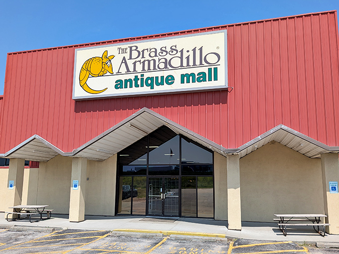 The Brass Armadillo's cheerful armadillo mascot welcomes treasure hunters to Nebraska's premier antiquing adventure.