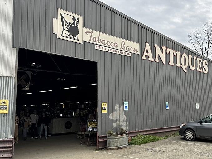 The bright yellow sign beckons treasure hunters like a vintage lighthouse, promising discoveries that'll make your antique-loving heart skip a beat.